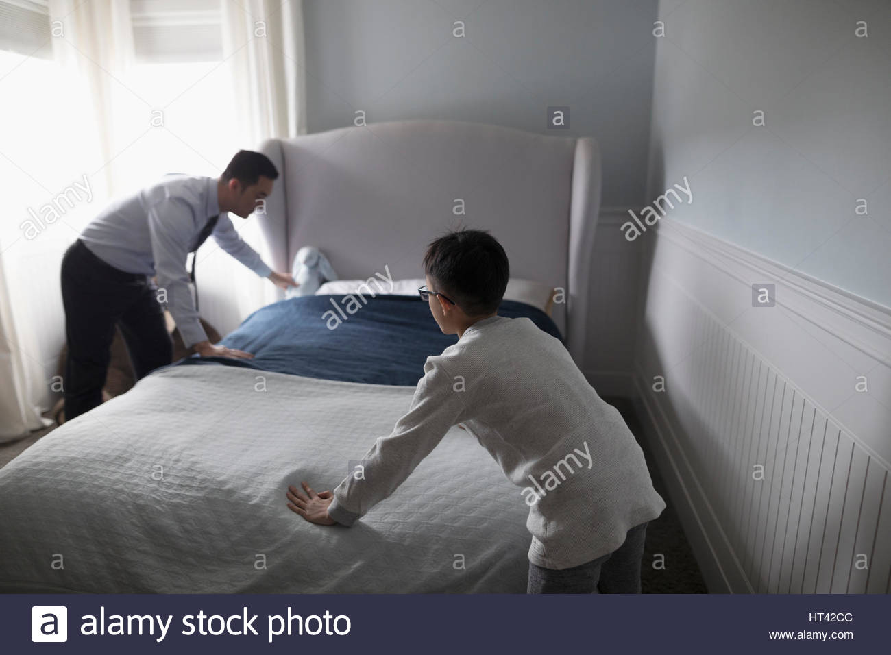 Father making son do chores hi-res stock photography and images - Alamy