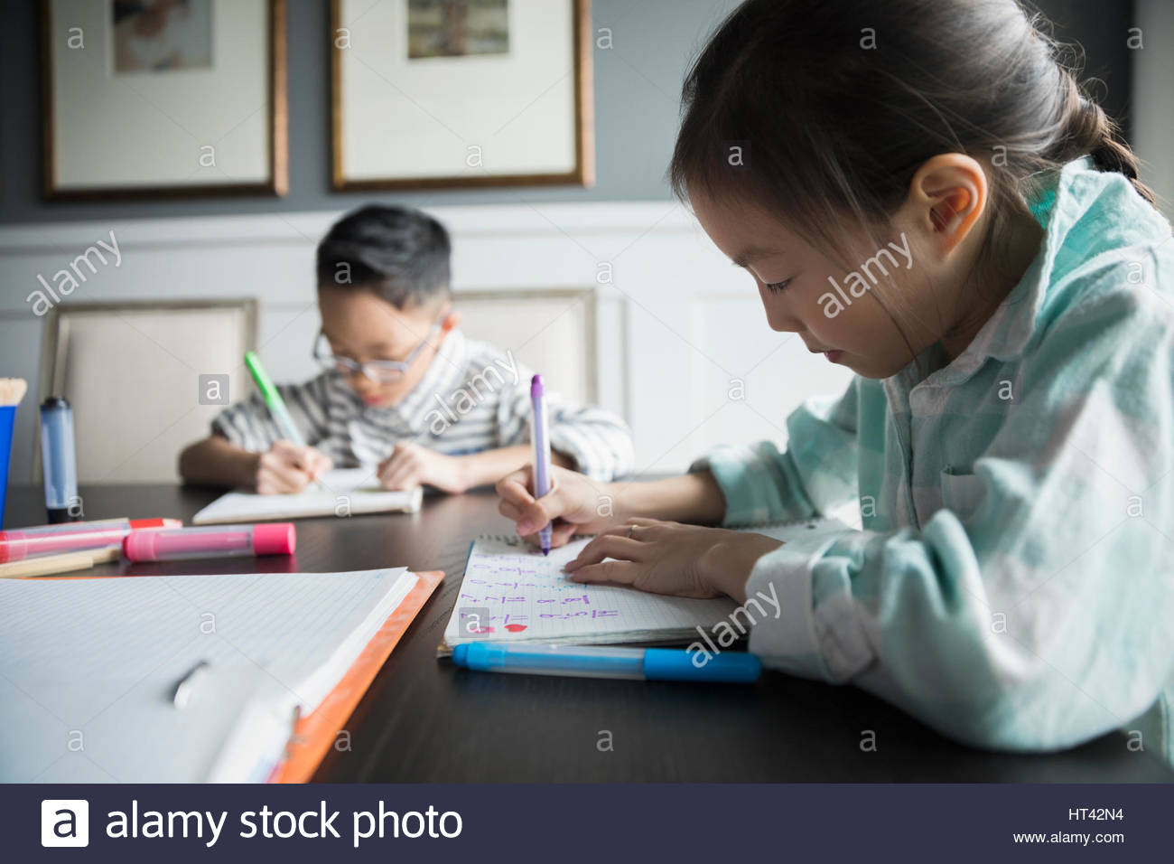 Asian boy doing math homework hi-res stock photography and images - Alamy