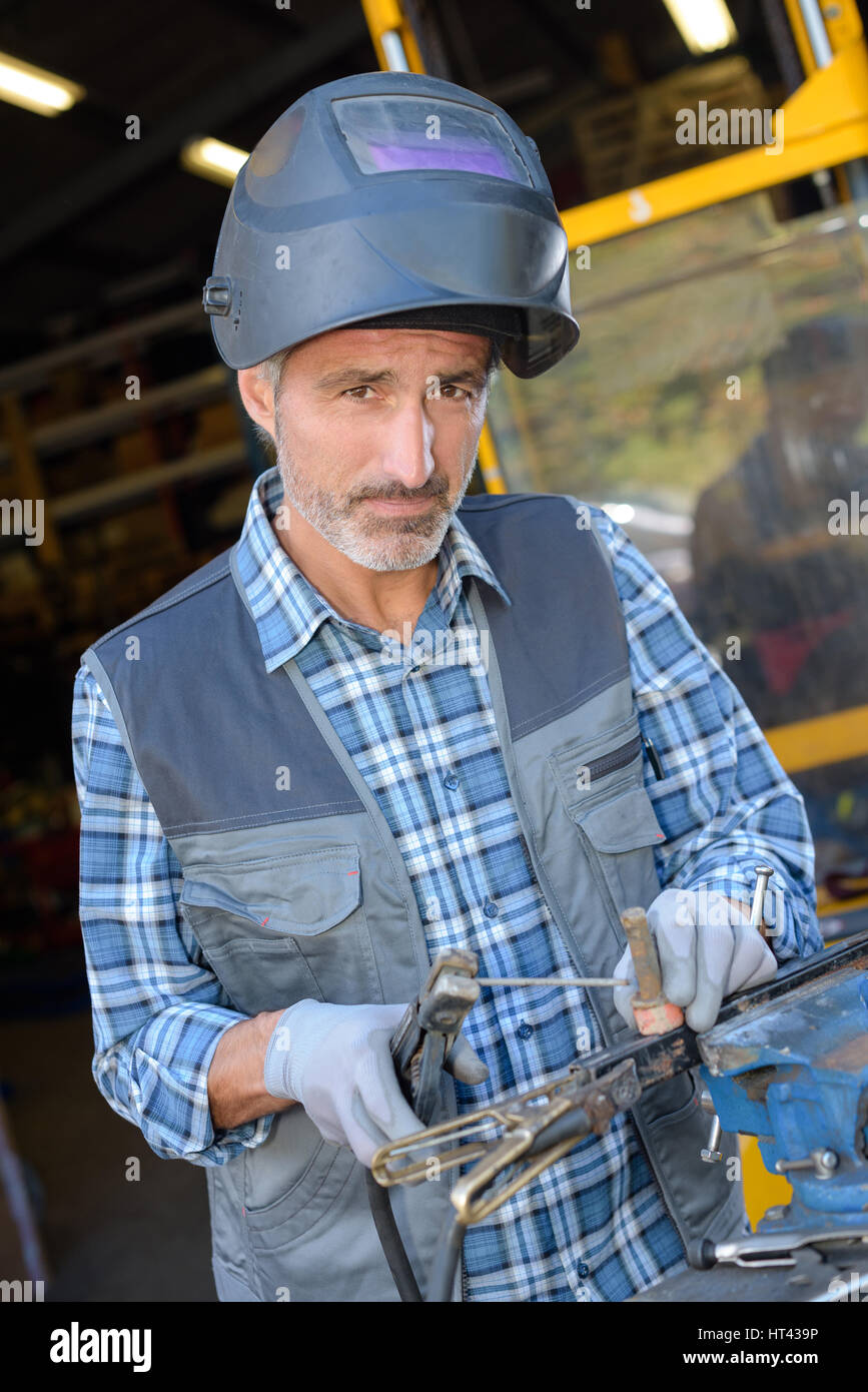 worker posing while working Stock Photo - Alamy