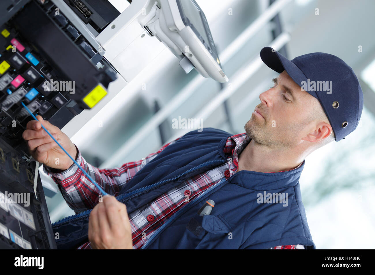 technician man repairing photocopy machine Stock Photo - Alamy