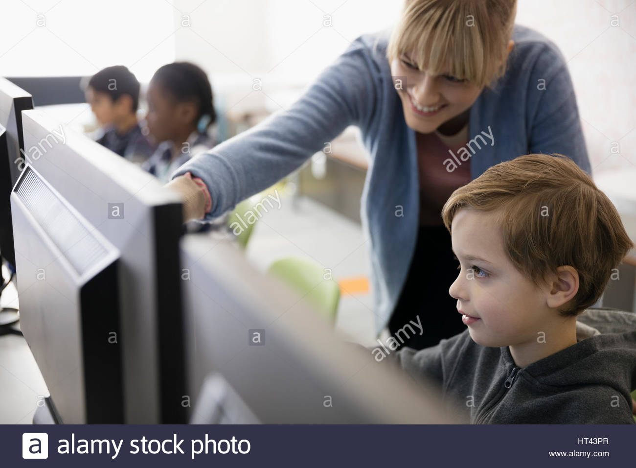 Two boys computer lab hi-res stock photography and images - Alamy