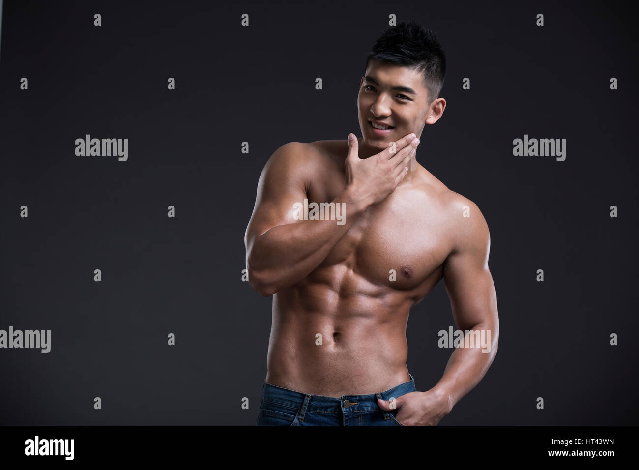 Portrait of young muscular man Stock Photo - Alamy