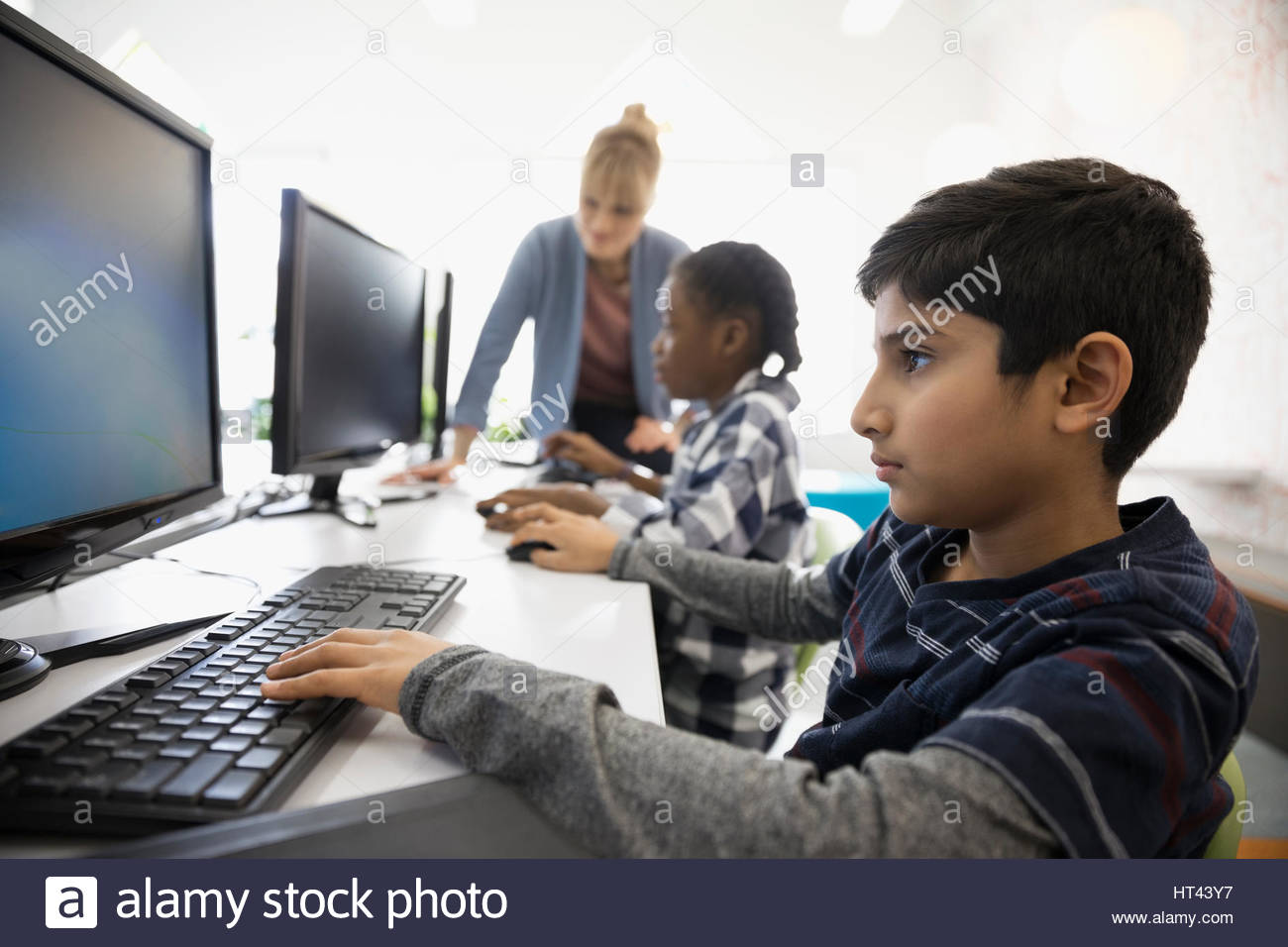 Black boys studying in a library hi-res stock photography and images ...