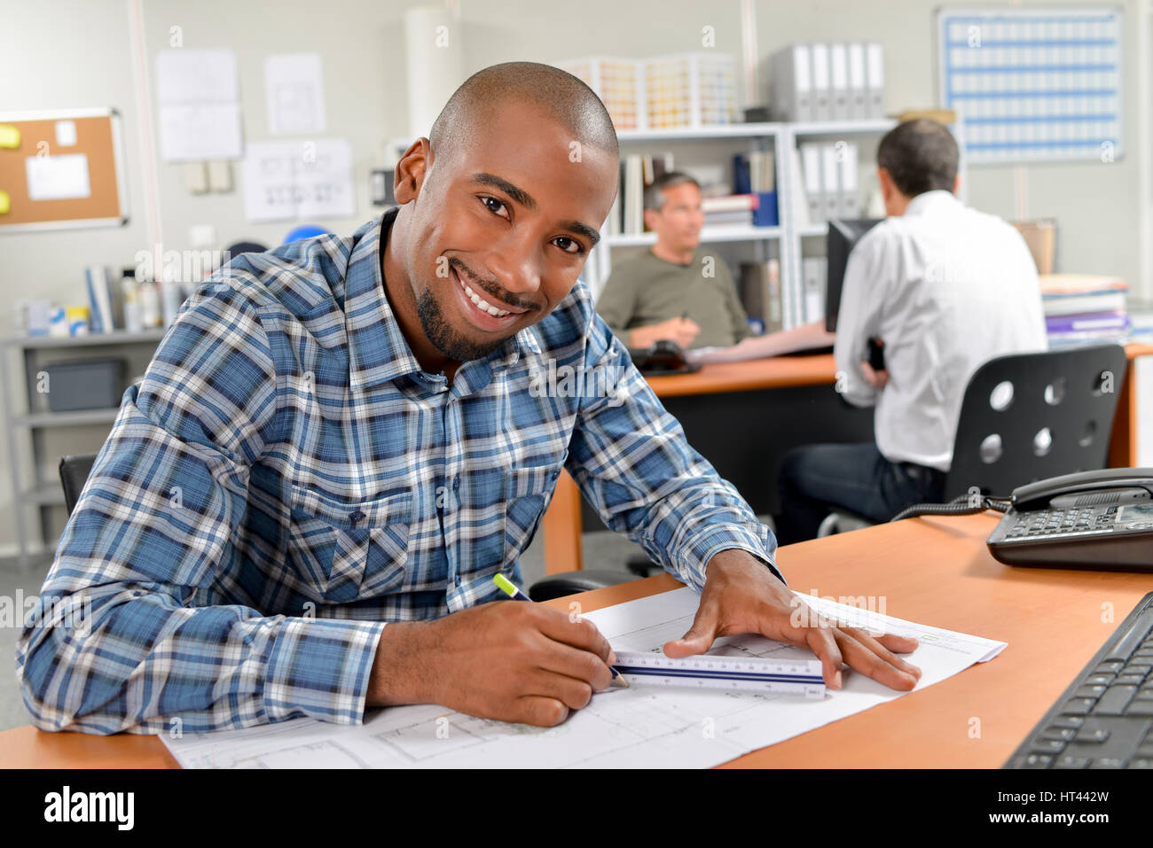 Office worker sat desk hi-res stock photography and images - Alamy