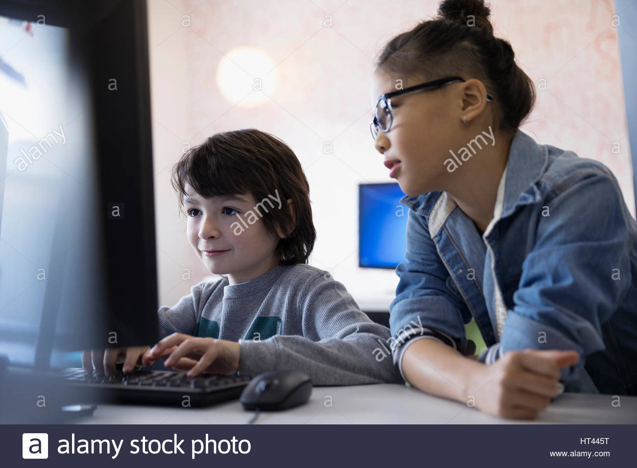 Group of girls working in computer lab hi-res stock photography and ...