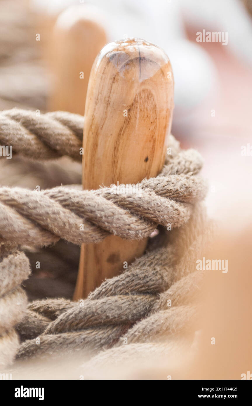 Close up image of traditional ships rope pegs Stock Photo - Alamy