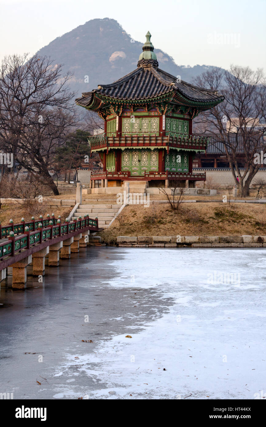 A view of a frozen pond at Gyeongbbokgung Palace in Seoul, South Korea ...
