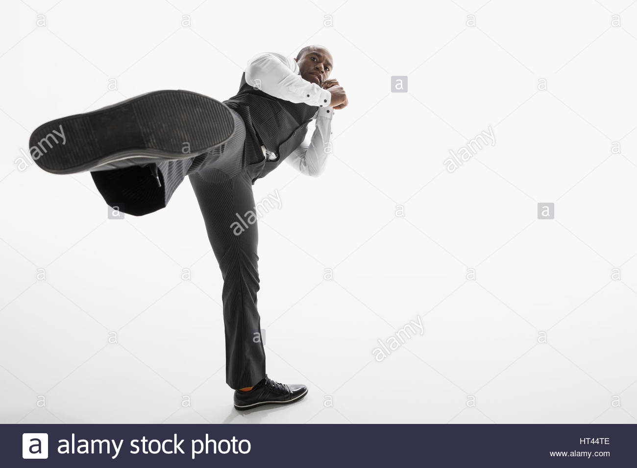 Man kicking camera hi-res stock photography and images - Alamy