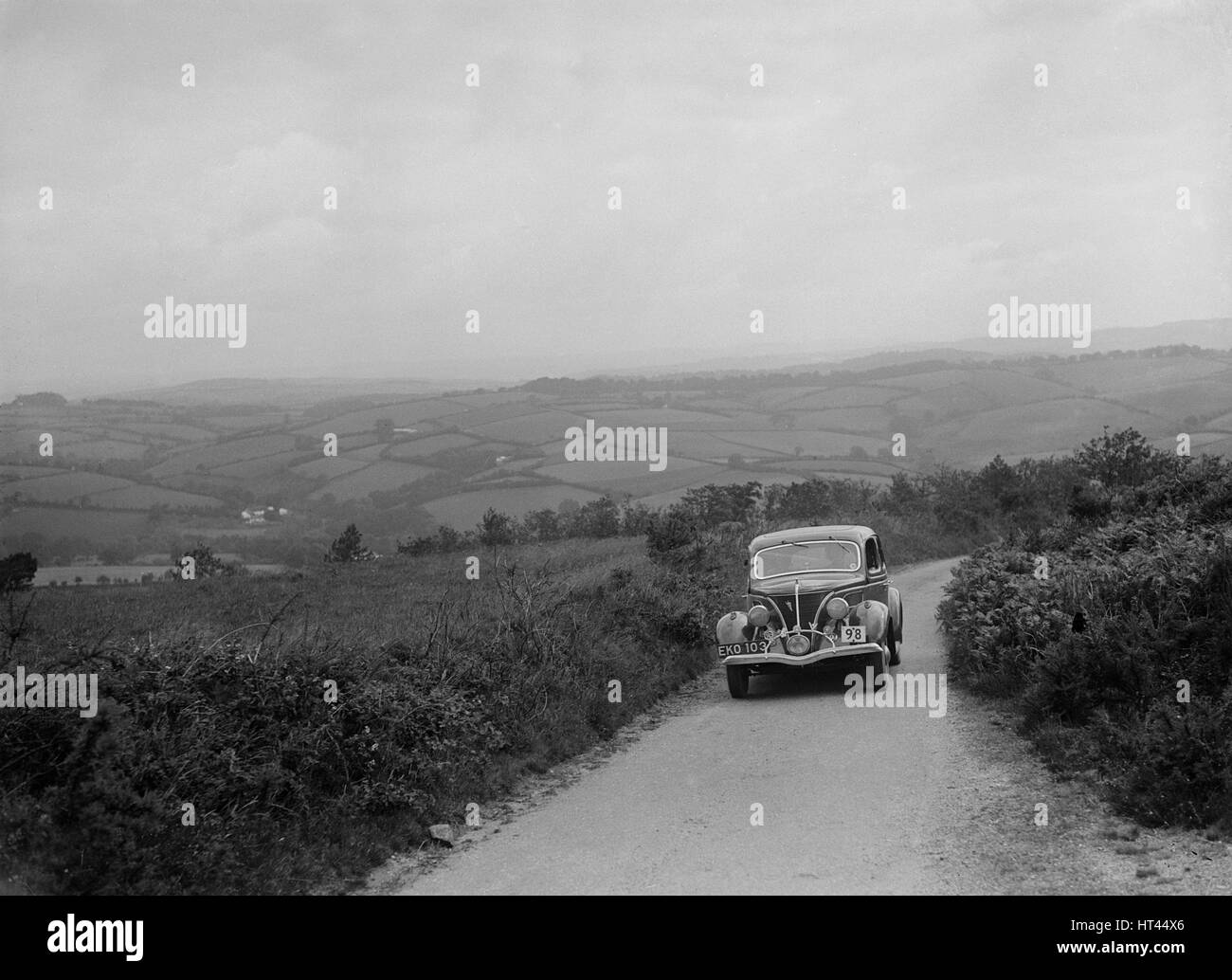 Ford V8 competing in the MCC Torquay Rally, 1938. Artist: Bill Brunell ...