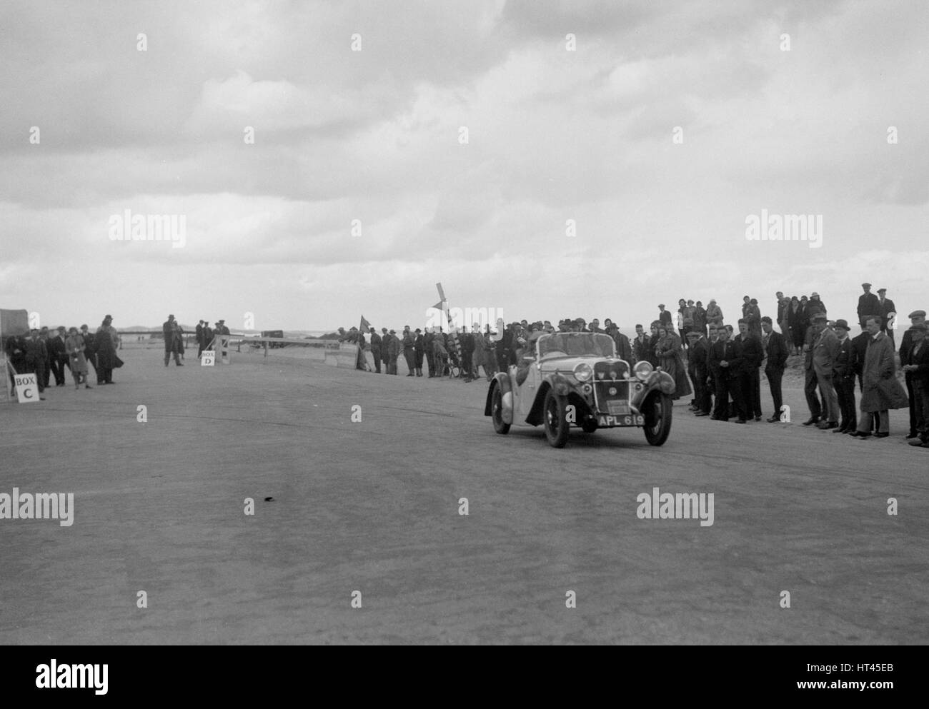 Singer open sports competing in the RSAC Scottish Rally, 1934. Artist ...