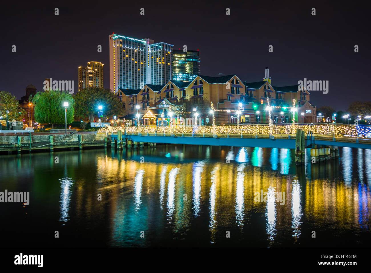 Bridge and buildings at the Inner Harbor at night, in Baltimore ...