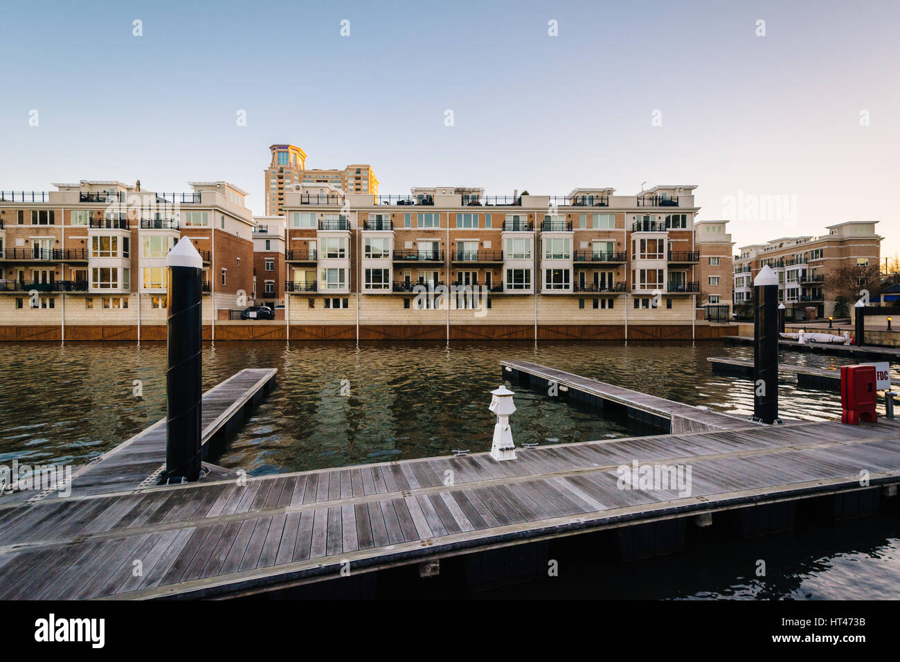 Docks and waterfront residences at the Inner Harbor in Baltimore ...