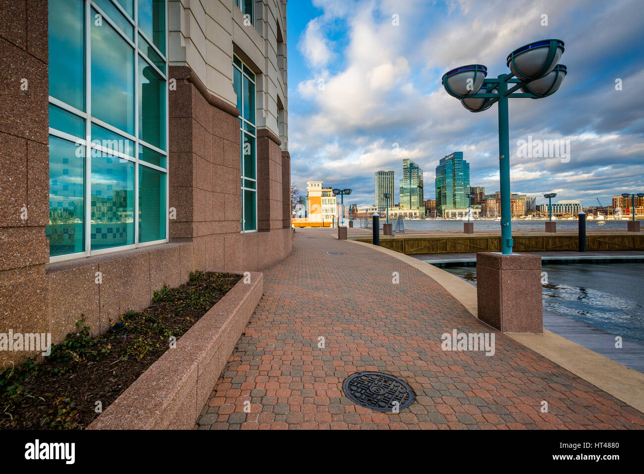 Walkway and the Harborview Tower, in Baltimore, Maryland Stock Photo ...