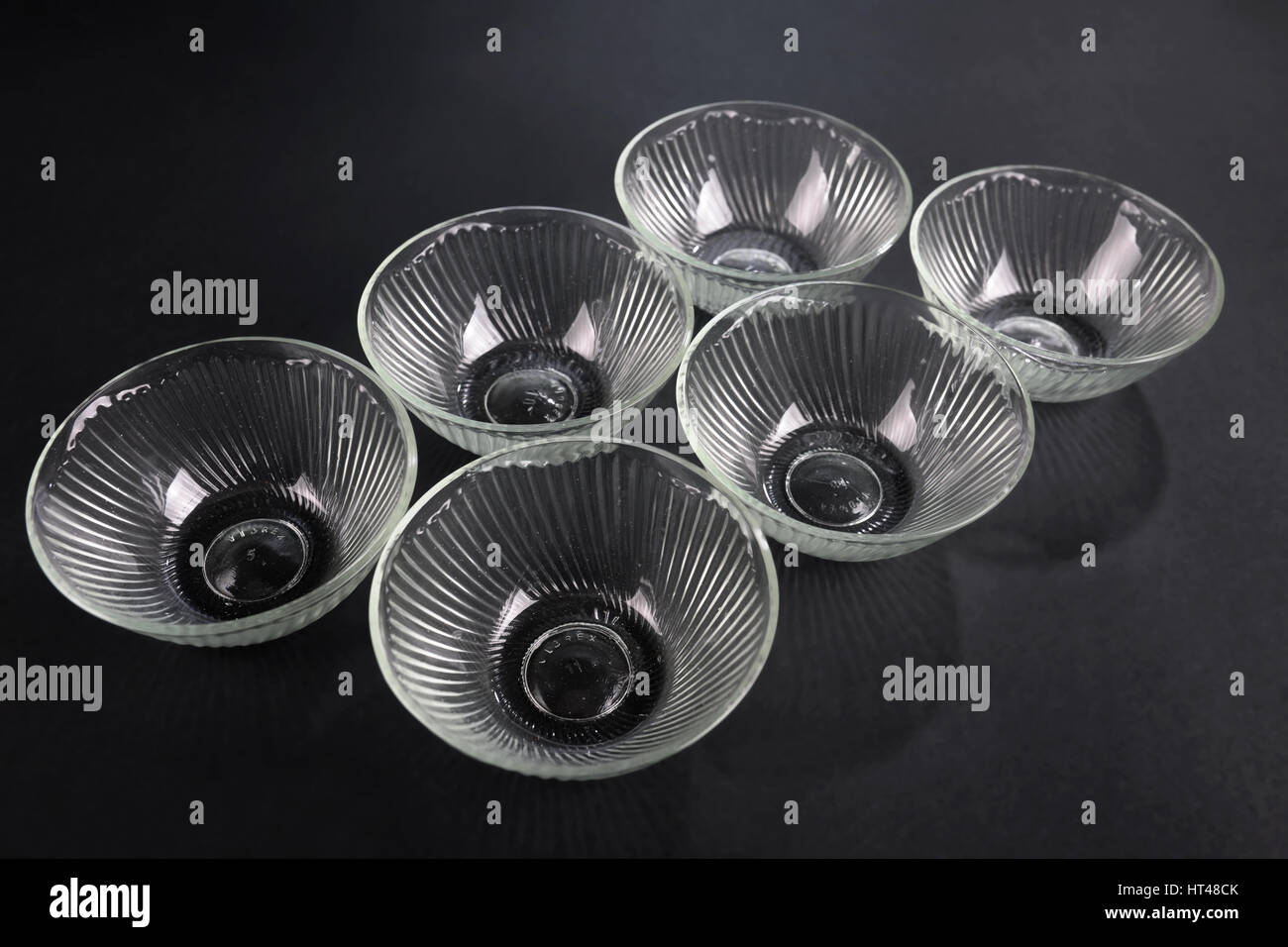 Set of six shallow glass dishes cake Stock Photo - Alamy
