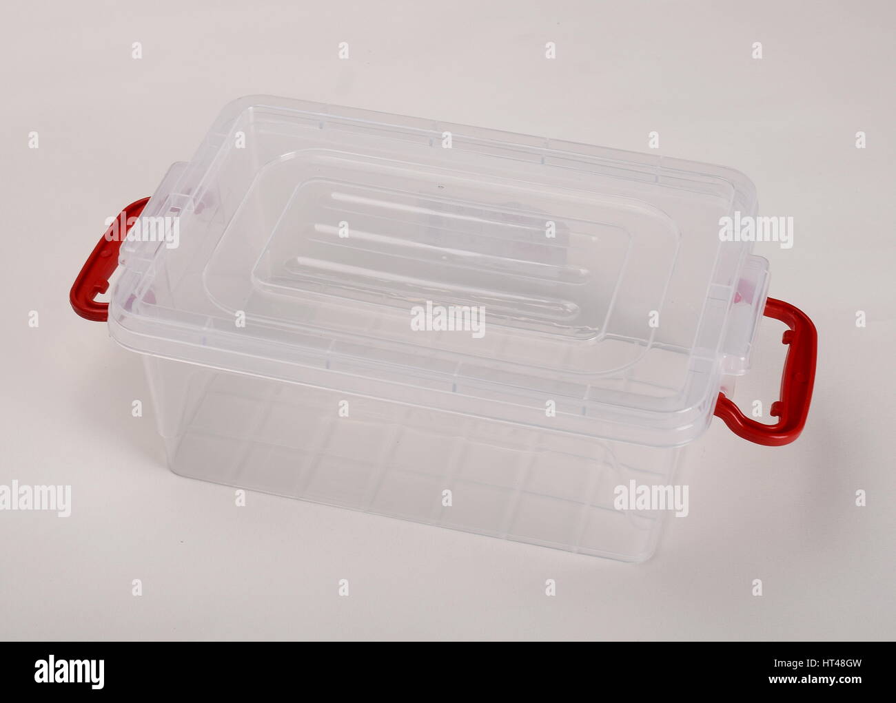 New plastic transparent box with handles and lid for tools, isloated on ...