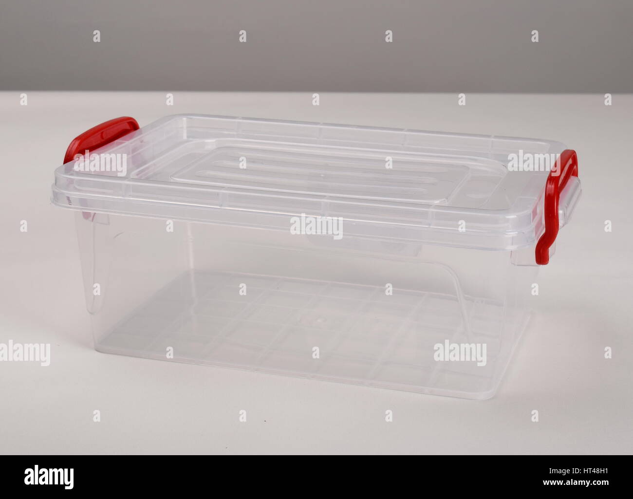 New plastic transparent box with handles and lid for tools, isloated on ...