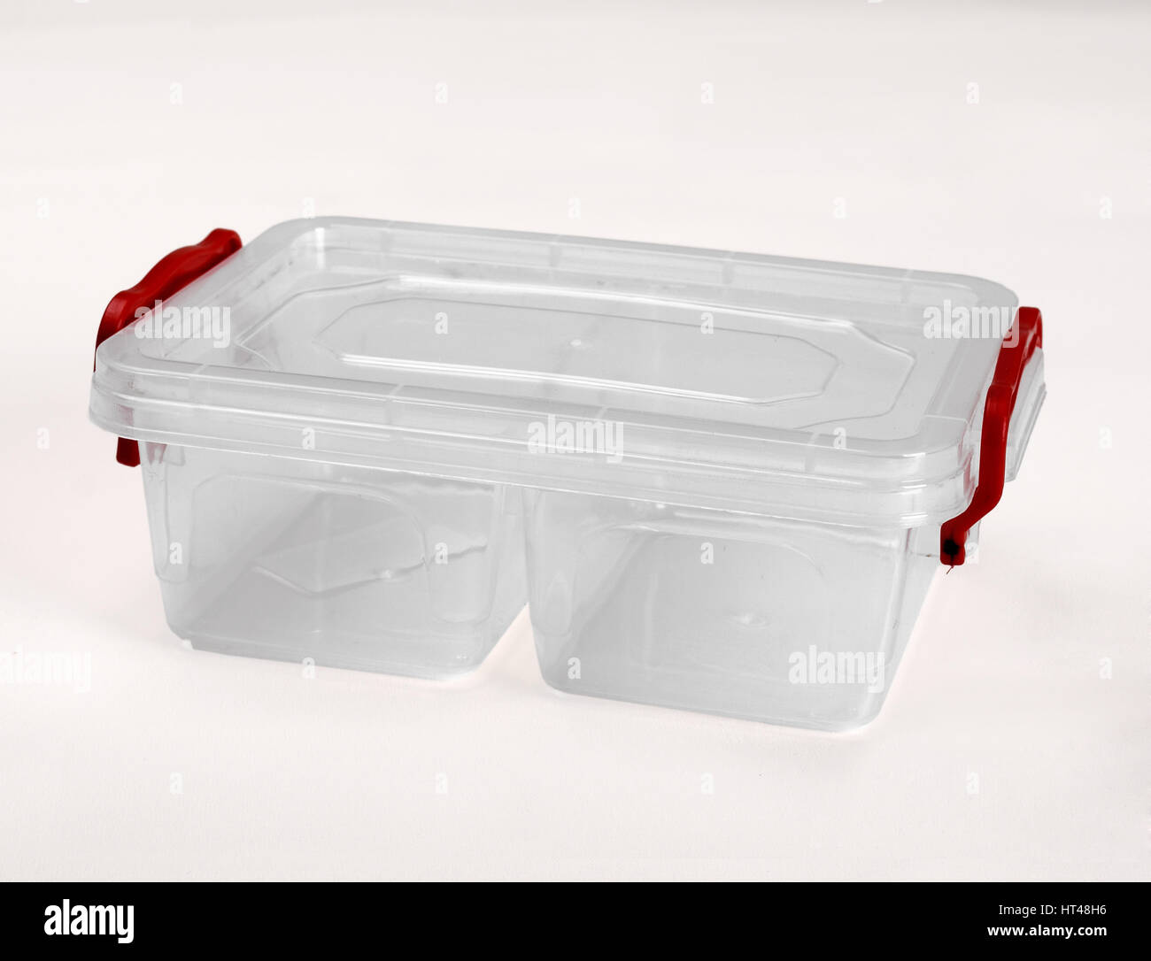 New plastic transparent box with handles and lid, isolated on white ...