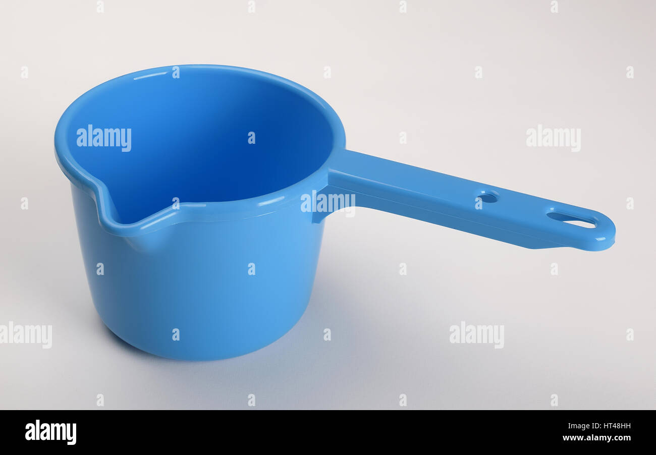 Blue water dipper isolated on white background. Plastic scoop Stock ...