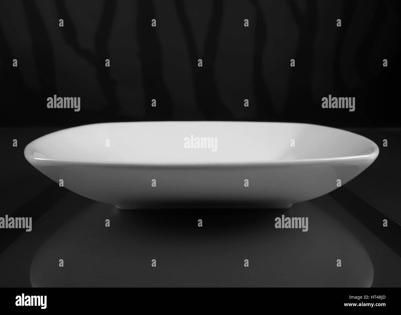 Detail of square shallow bowl serving dish Stock Photo - Alamy