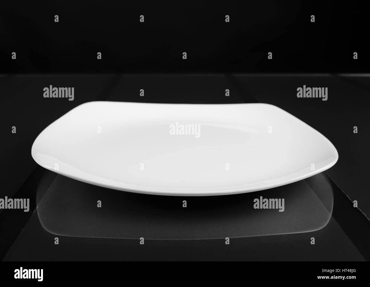 Porcelain square shallow bowl serving dish Stock Photo - Alamy