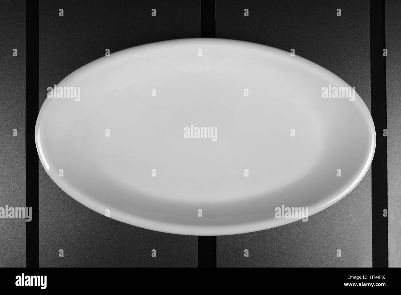 Porcelain round square shallow dish Stock Photo - Alamy