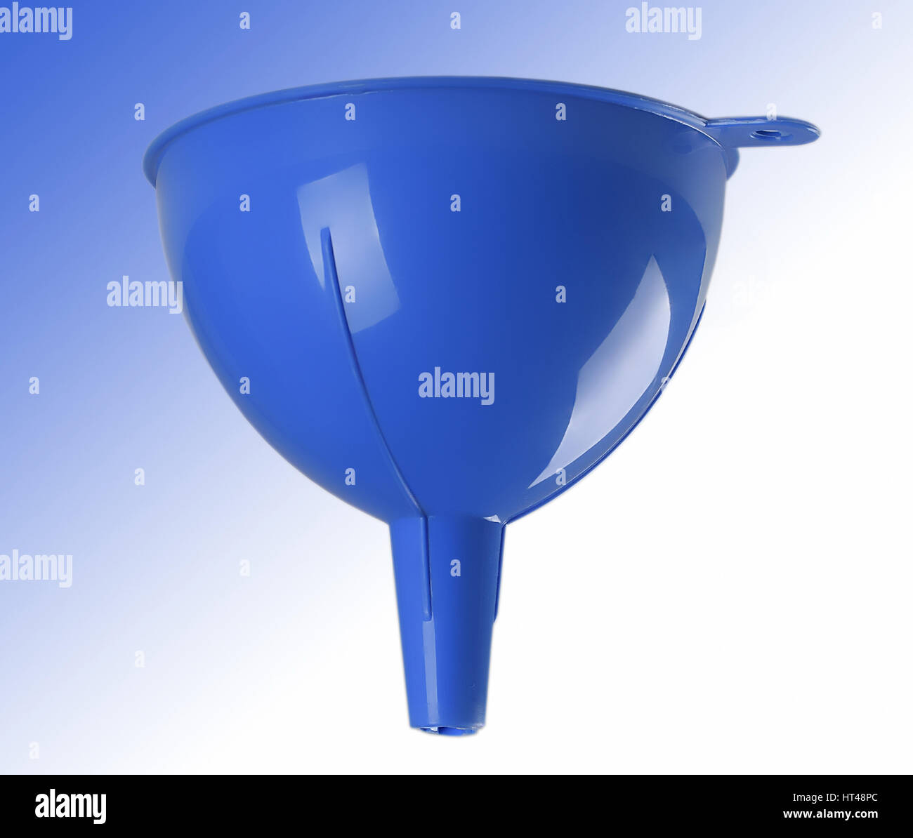 Blue plastic kitchen funnel liquid Stock Photo - Alamy