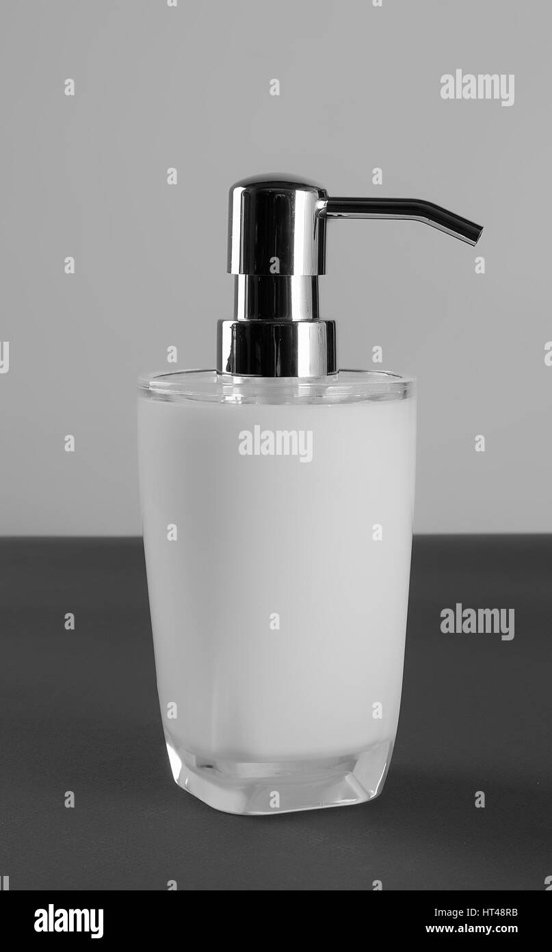 Glass bottles with liquid soap or shower gel Stock Photo - Alamy