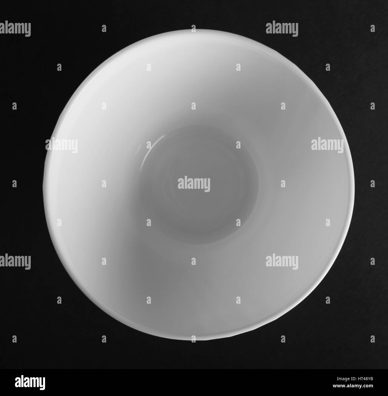 Deep round porcelain dish. White bowl top view Stock Photo - Alamy