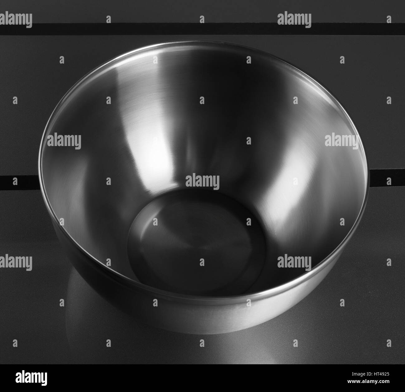 Kitchen mixing deep stainless steel on gray table Stock Photo - Alamy