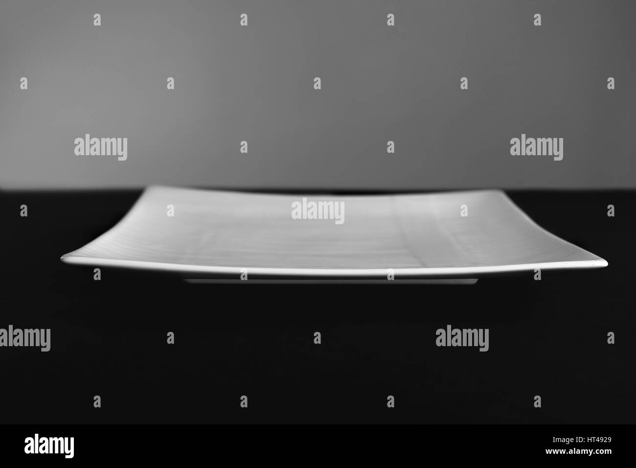 Porcelaine square shallow bowl Stock Photo - Alamy