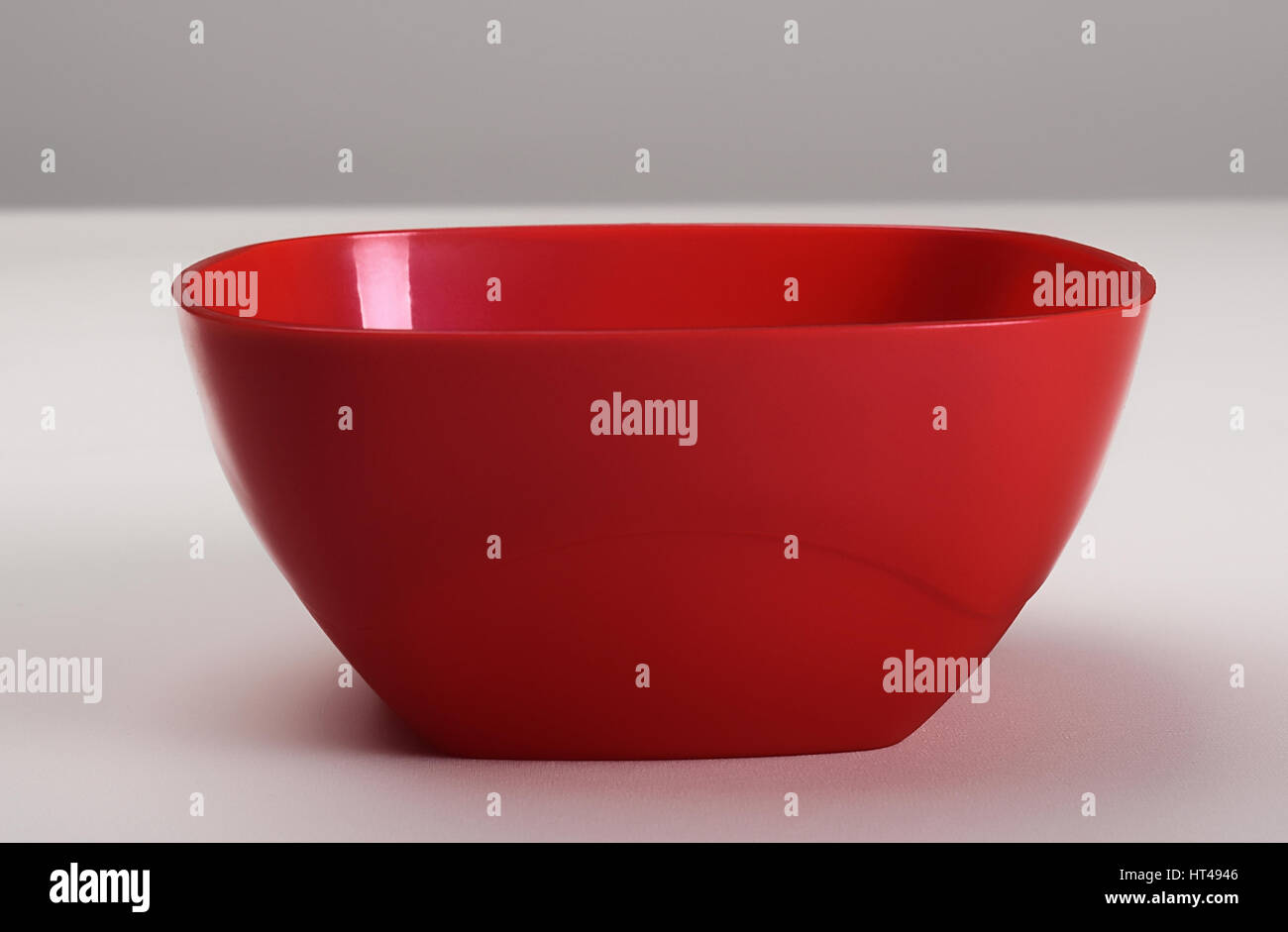Red plastic deep dish Stock Photo - Alamy