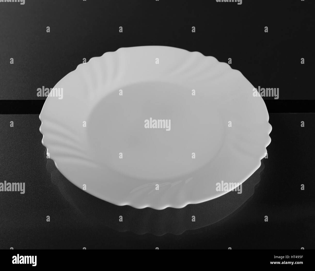 Porcelain round shallow dish. Top view Stock Photo - Alamy