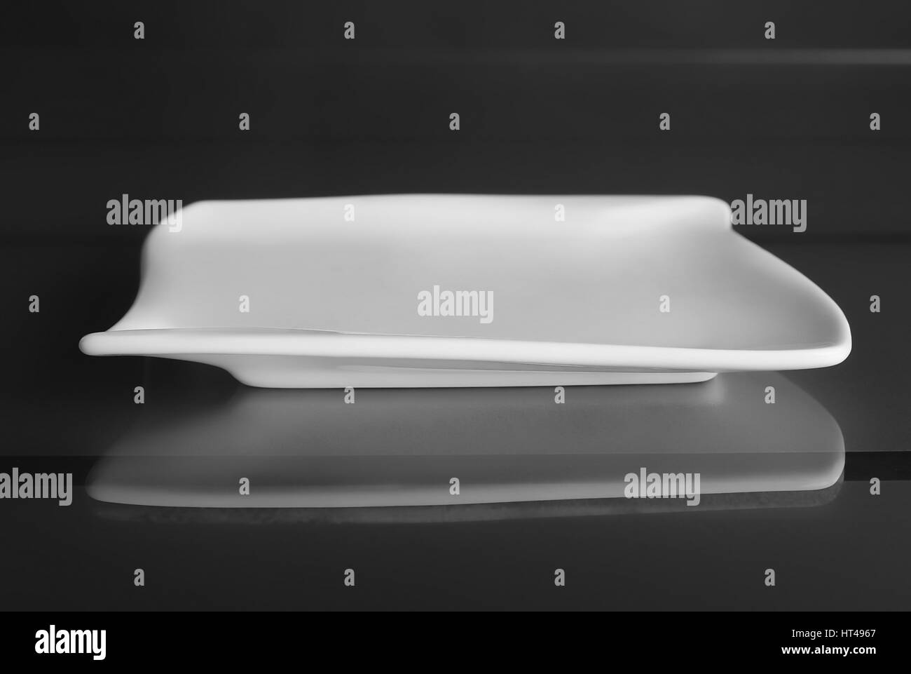 Porcelain square shallow dish Stock Photo - Alamy