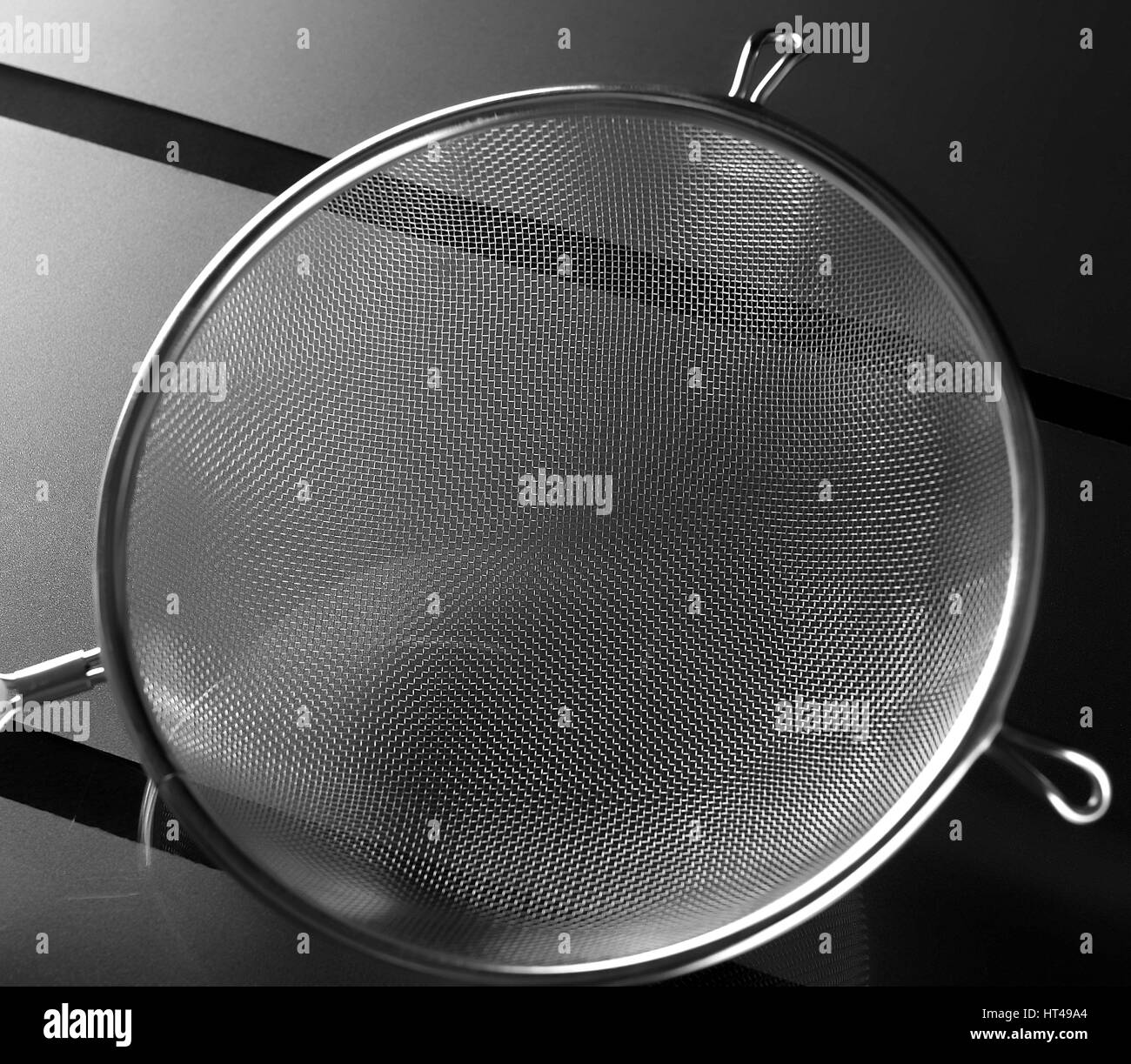 Mesh sieve Black and White Stock Photos & Images - Alamy