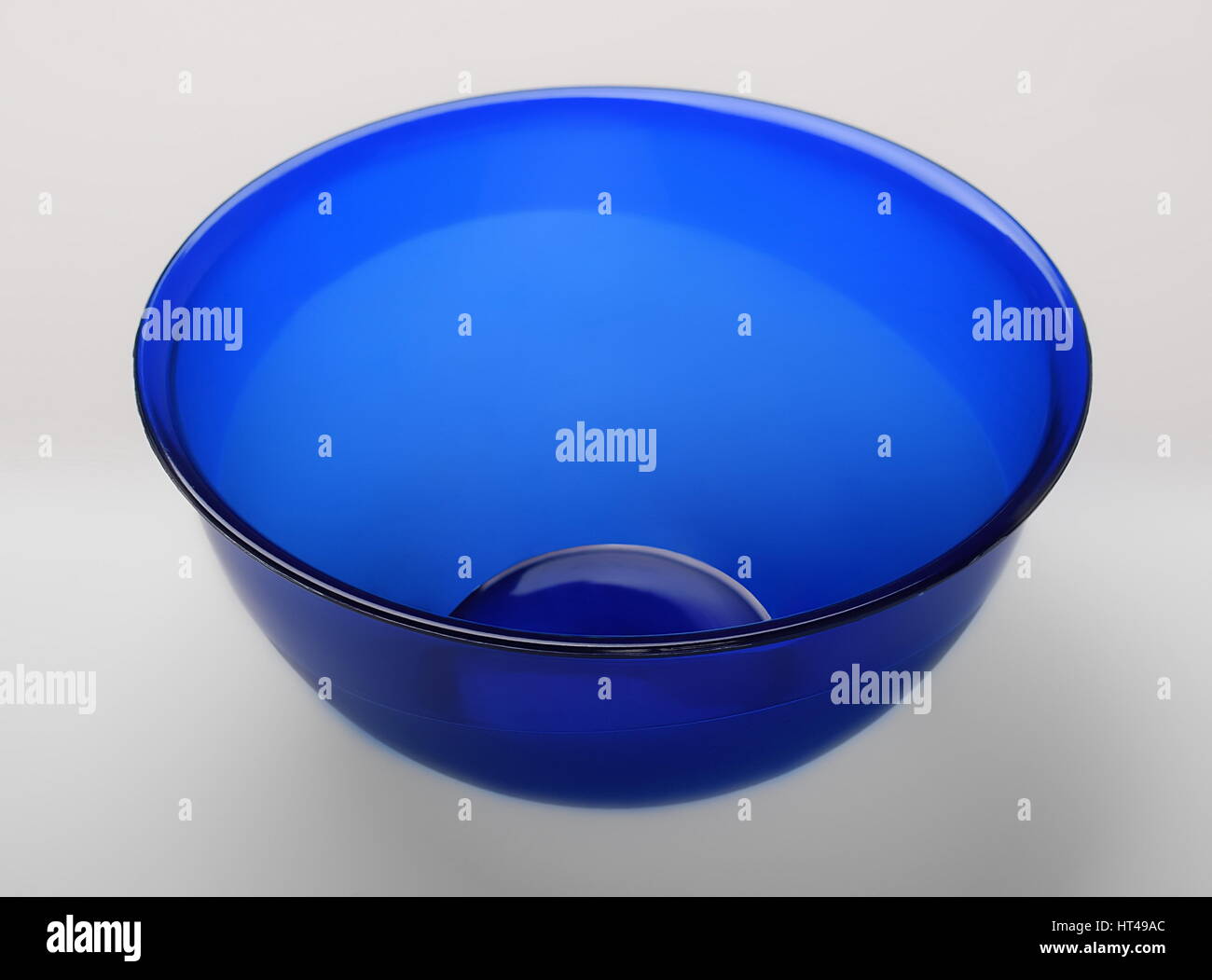 Blue transparent plastic deep dish, isolated on white background Stock ...
