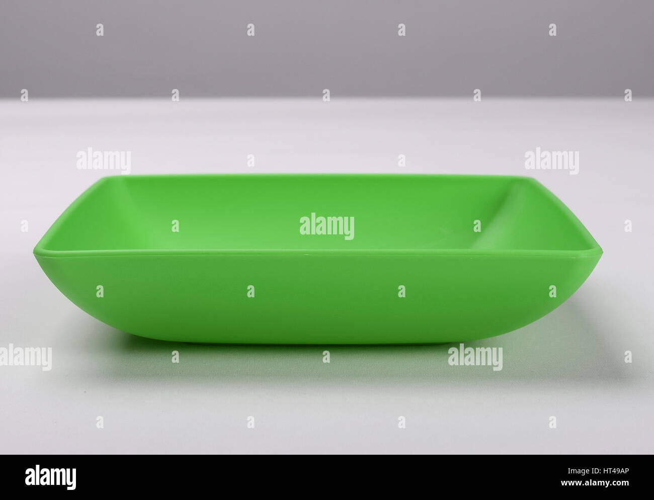 Green plastic shallow dish food Stock Photo - Alamy
