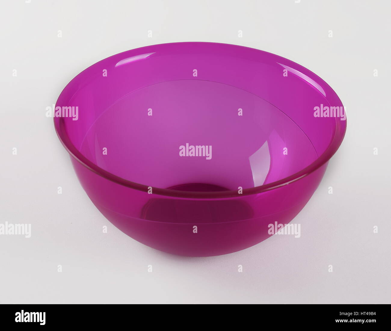 Purple transparent plastic deep dish, isolated on white background ...