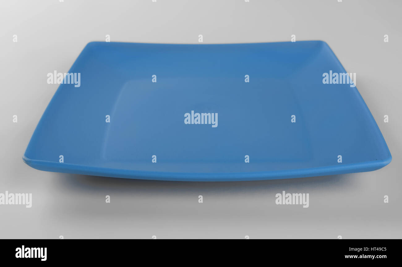 Blue plastic shallow dish food Stock Photo - Alamy