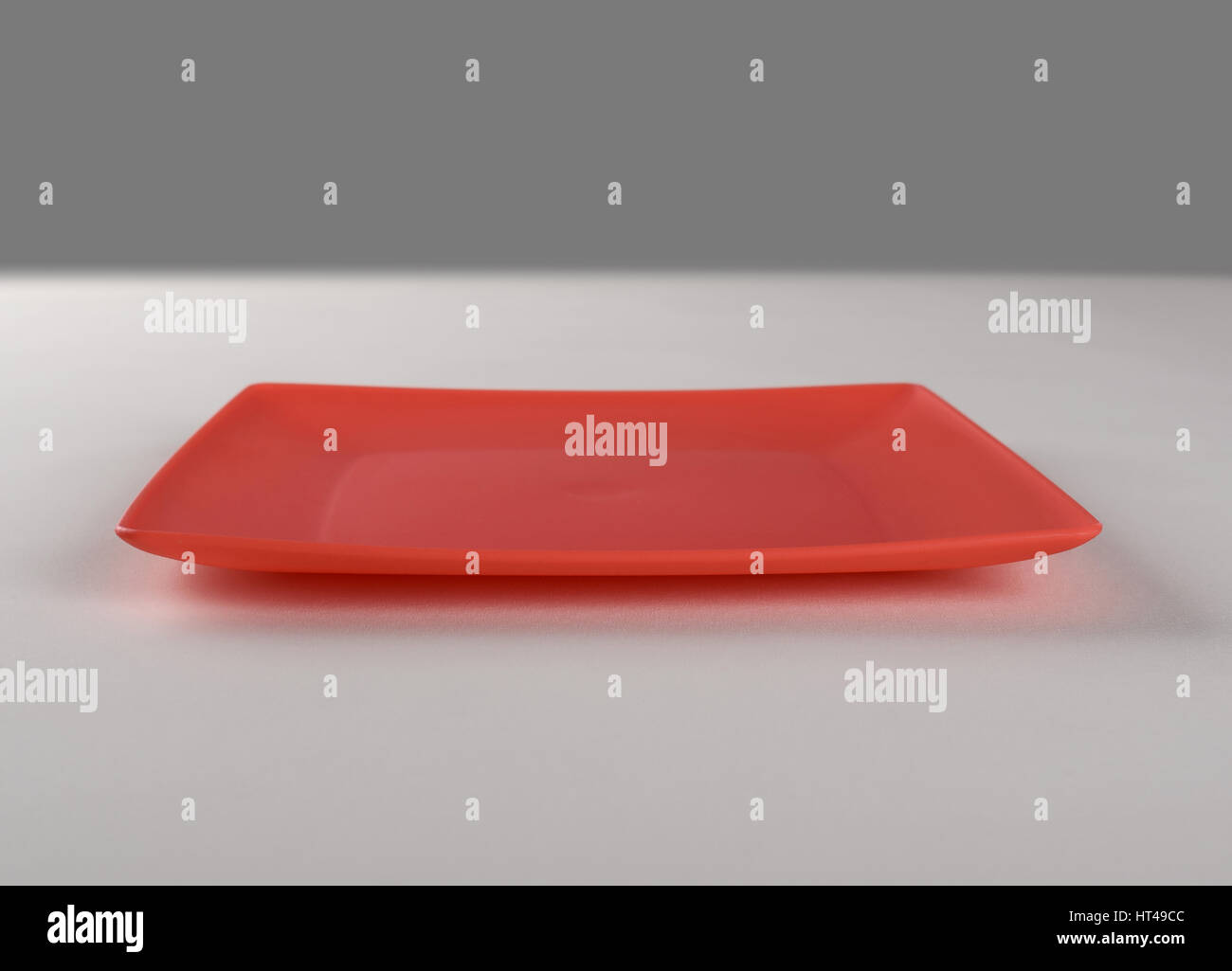Red plastic shallow dish food Stock Photo - Alamy