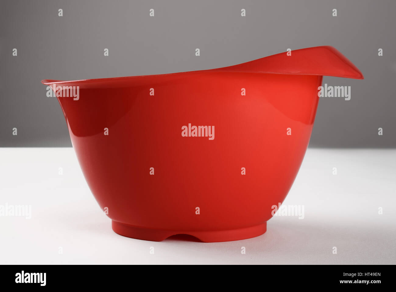 Red plastic container for stirring cake Stock Photo - Alamy