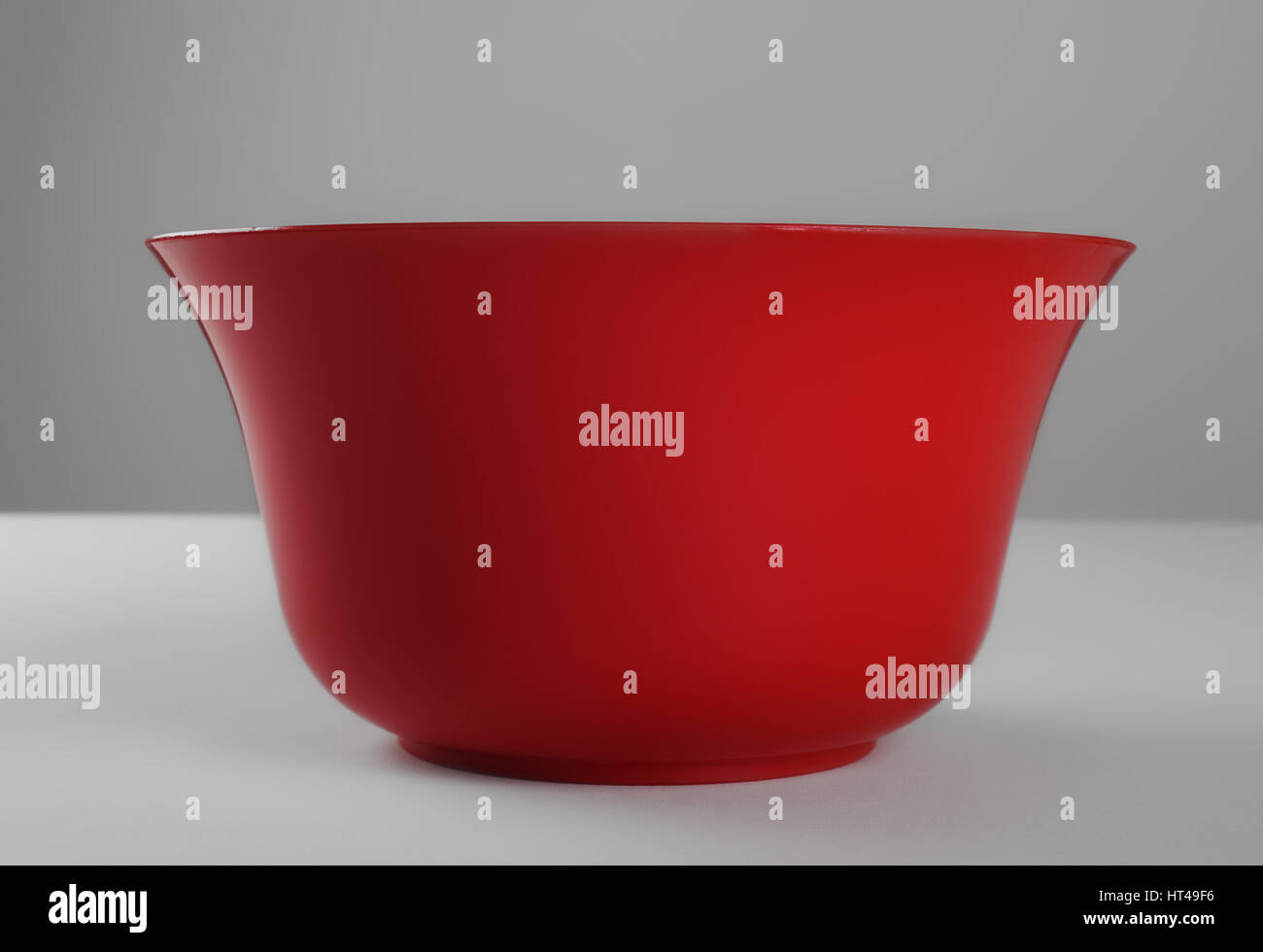 Red plastic deep dish, front view Stock Photo - Alamy
