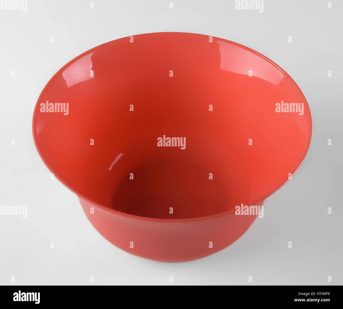 Red round plastic deep dish Stock Photo - Alamy