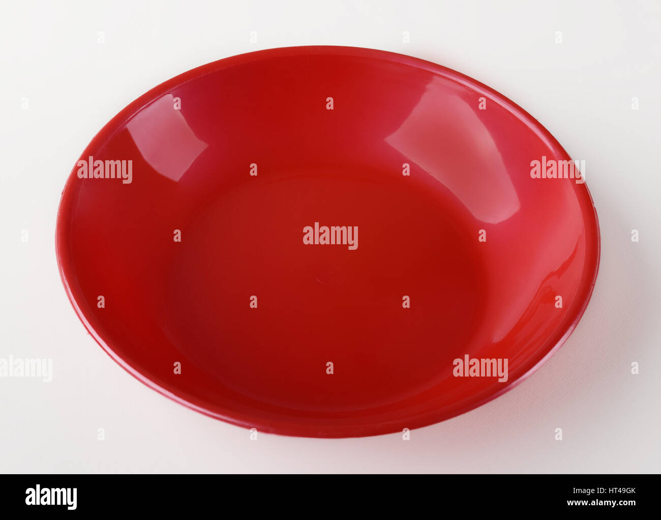 Red plastic shallow dish food Stock Photo - Alamy