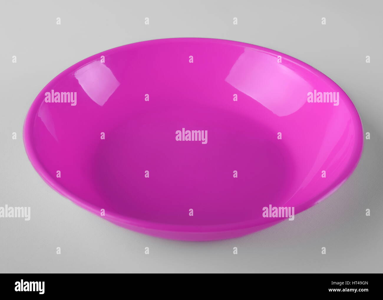 Pink plastic shallow dish food Stock Photo - Alamy