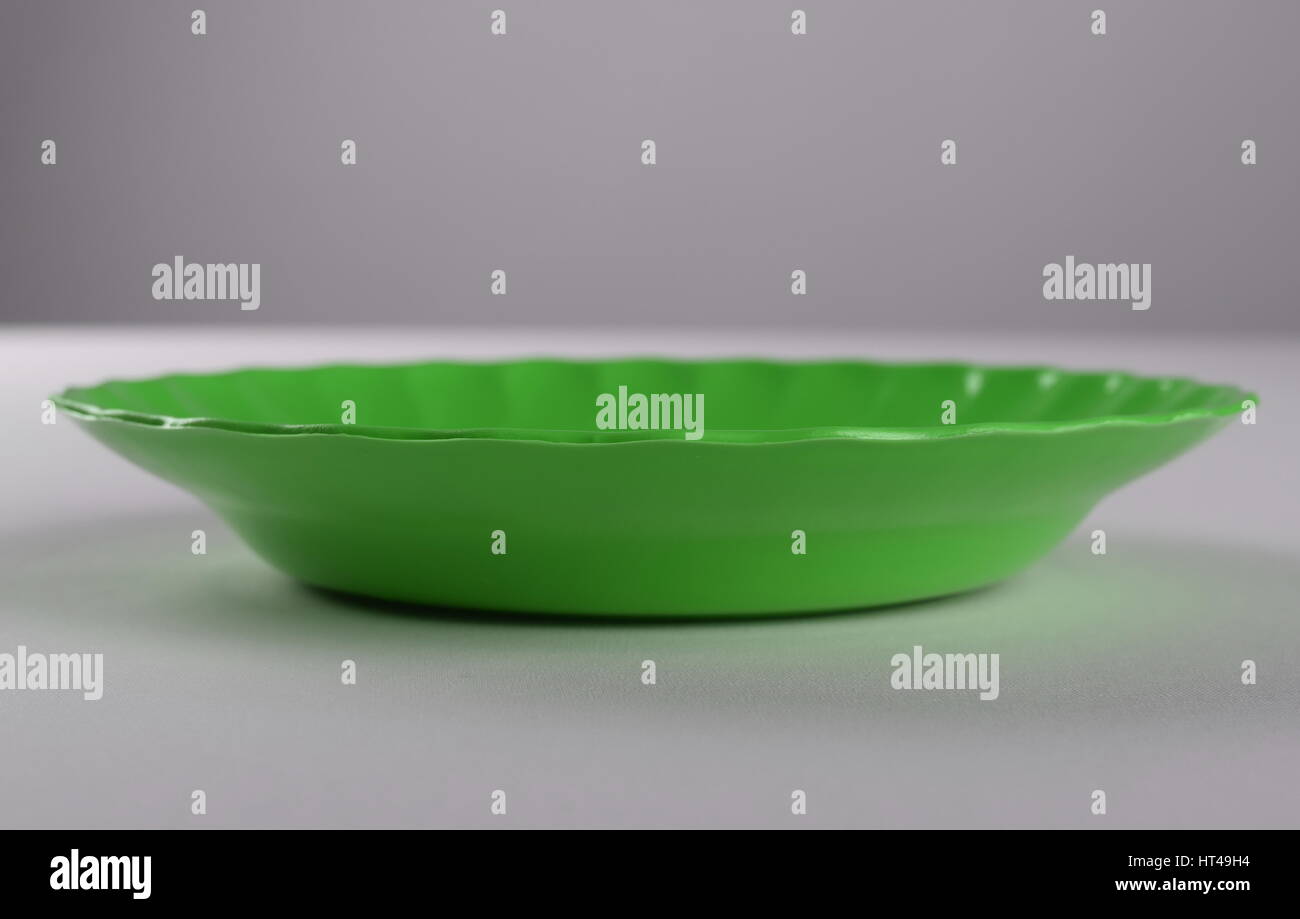 Green plastic shallow dish food Stock Photo - Alamy