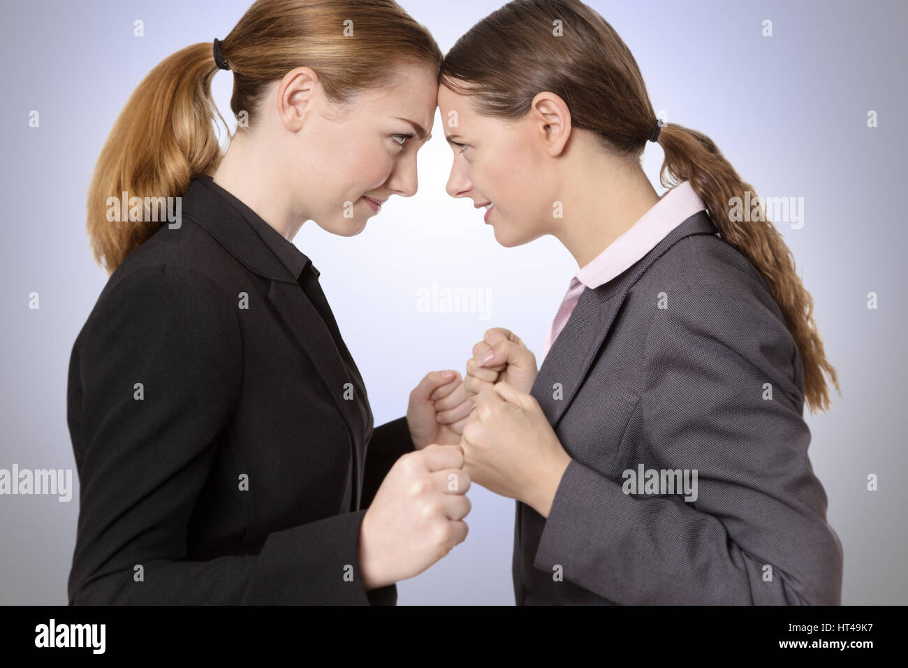 Two heads together business hi-res stock photography and images - Alamy