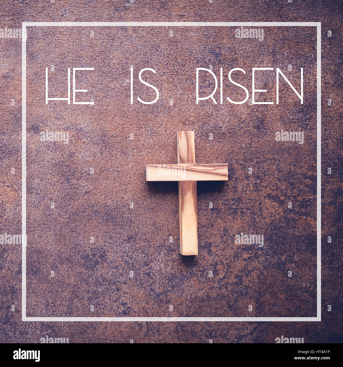 He is risen word and wooden cross on dark background Stock Photo - Alamy