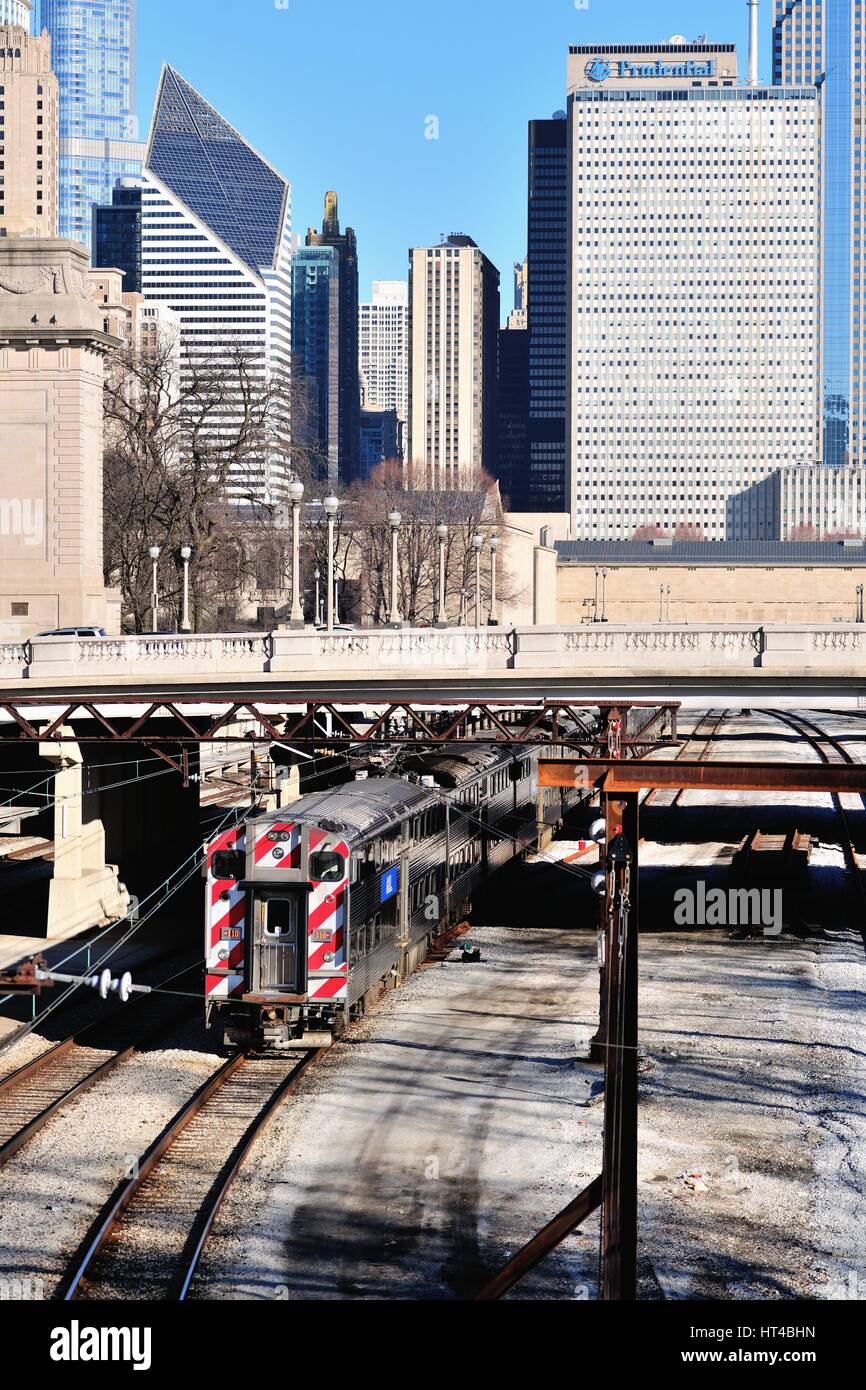 An inbound Metra commuter train arriving along electrified trackage at ...