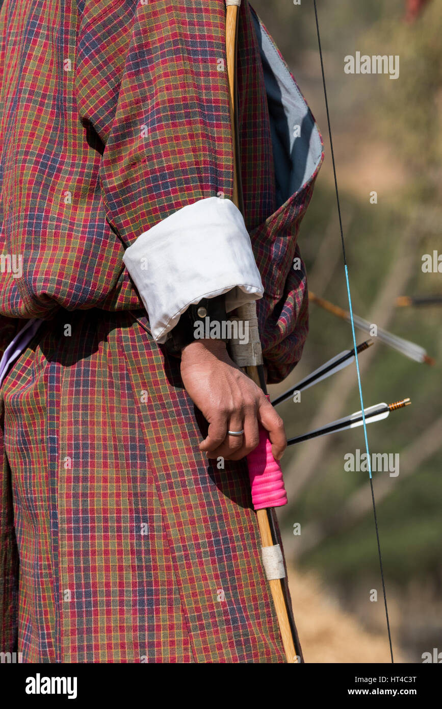 Bhutan, Thimphu, capital of Bhutan. Local archery competition played in ...