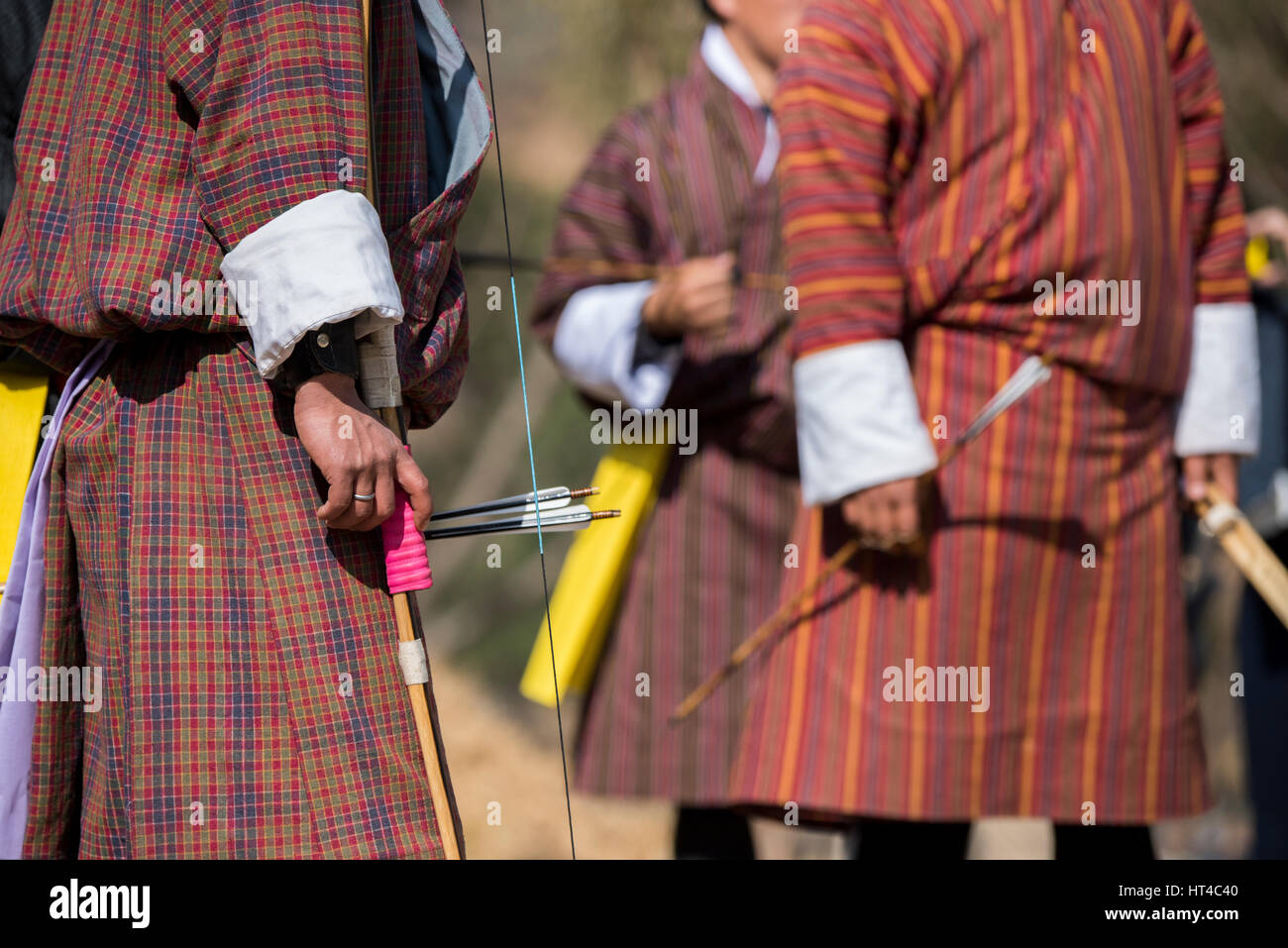 Bhutan, Thimphu, capital of Bhutan. Local archery competition played in ...